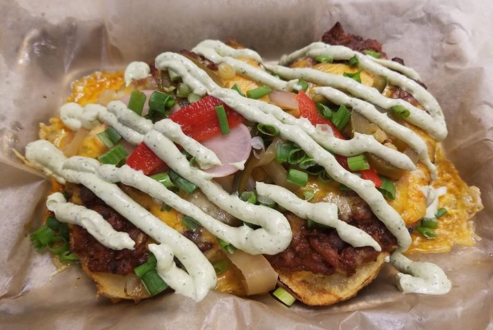 Pigs Eatin’ Ribs Jumbo Chili-Cheese Tater Skins | Food | Northern Express